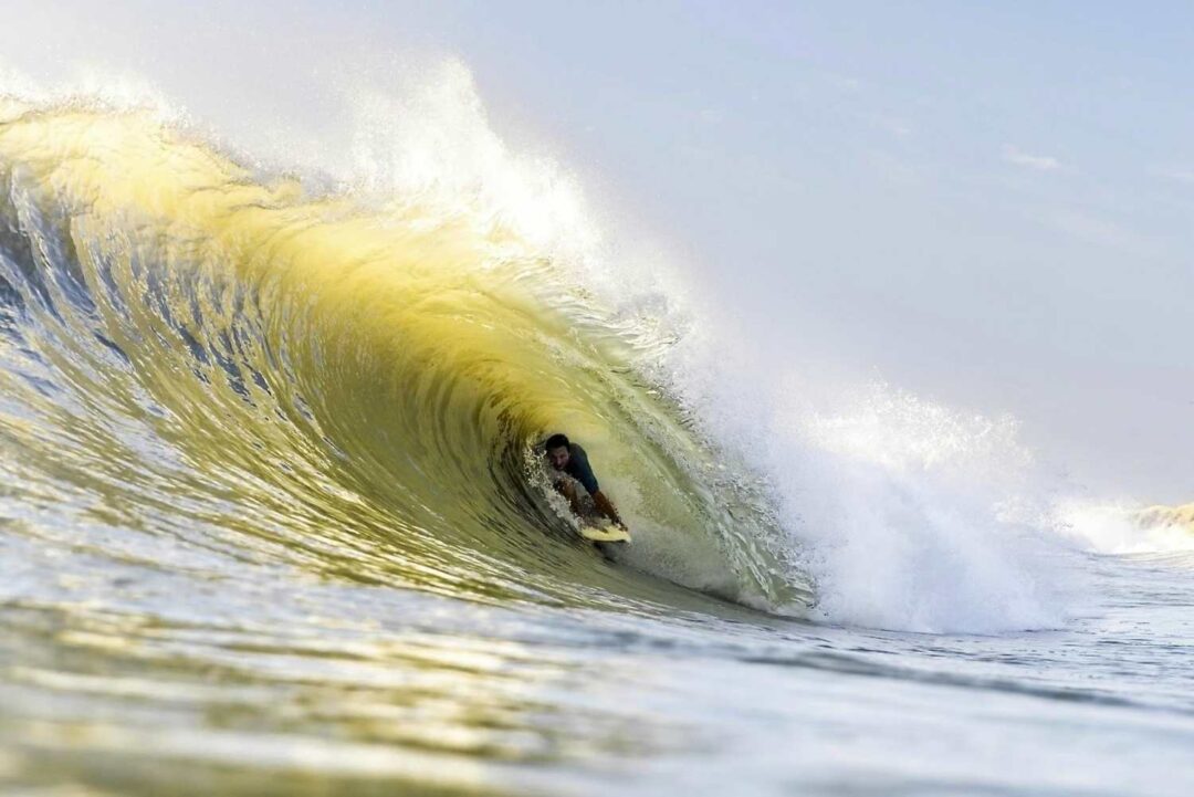 Ross Byrd flying in the lime green eye of a hurricane Lee barrel on the ...